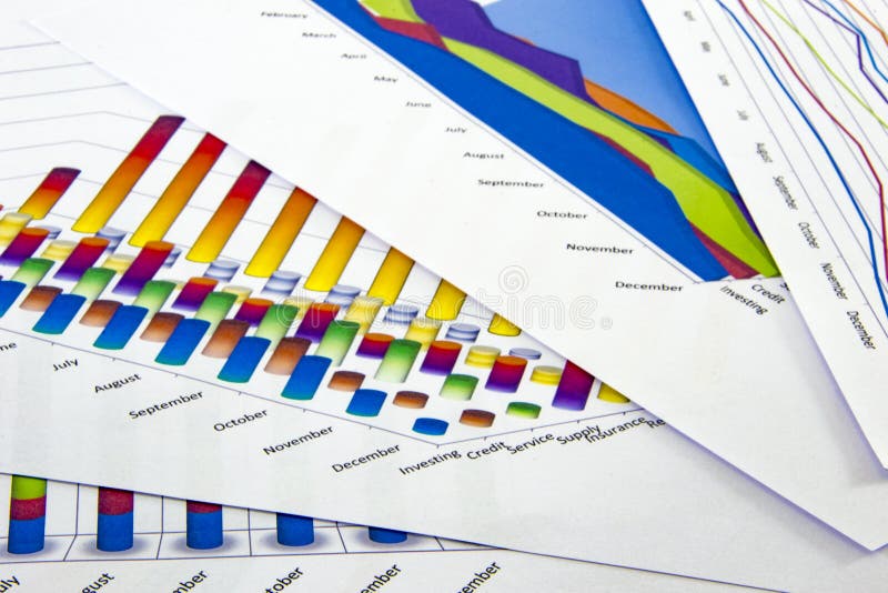 Preparing Report. Blue Graphs and Charts. Business Reports and Pile of ...
