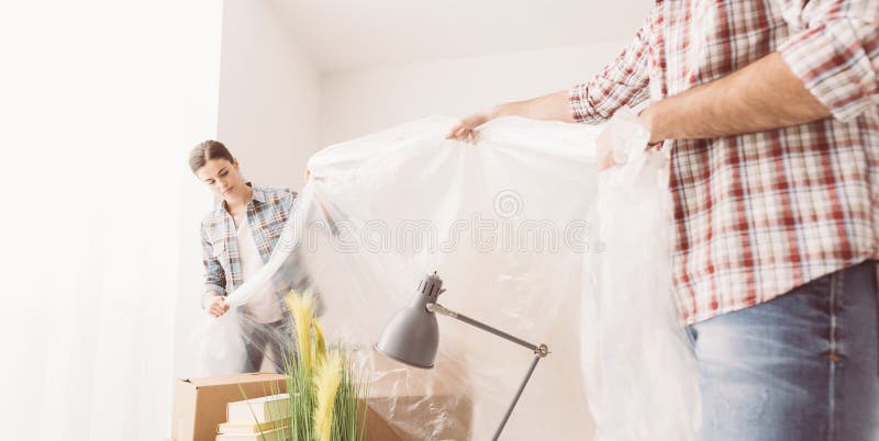 Preparing a Room for Painting Stock Photo - Image of friends, sheets ...