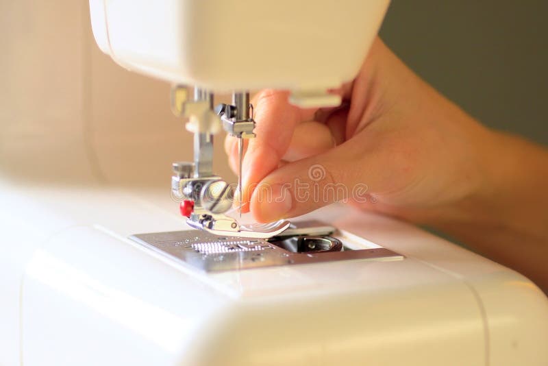 Preparing the Sewing Machine for Work. Close Up View. Stock Photo ...