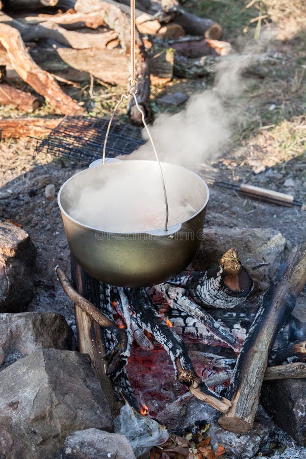 Preparing of a Soup in Open Cauldron Stock Photo - Image of cauldron ...