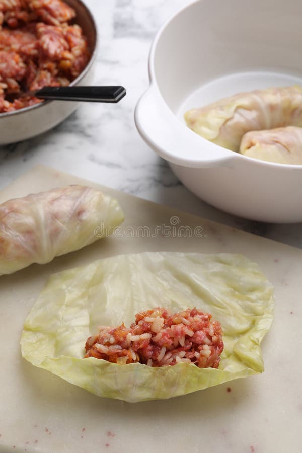 Preparing Stuffed Cabbage Rolls on White Table Stock Image - Image of ...