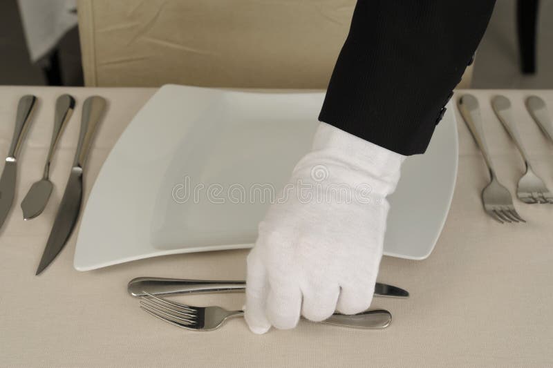 Preparing a Table in a Restaurant Stock Photo - Image of place, table ...