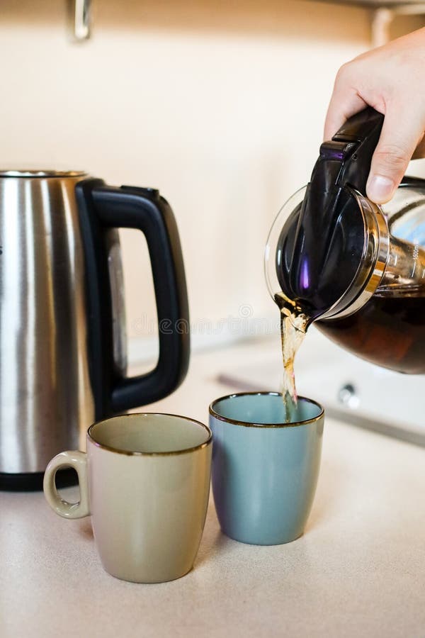 Preparing for a tea party stock image. Image of ceramic - 271915629