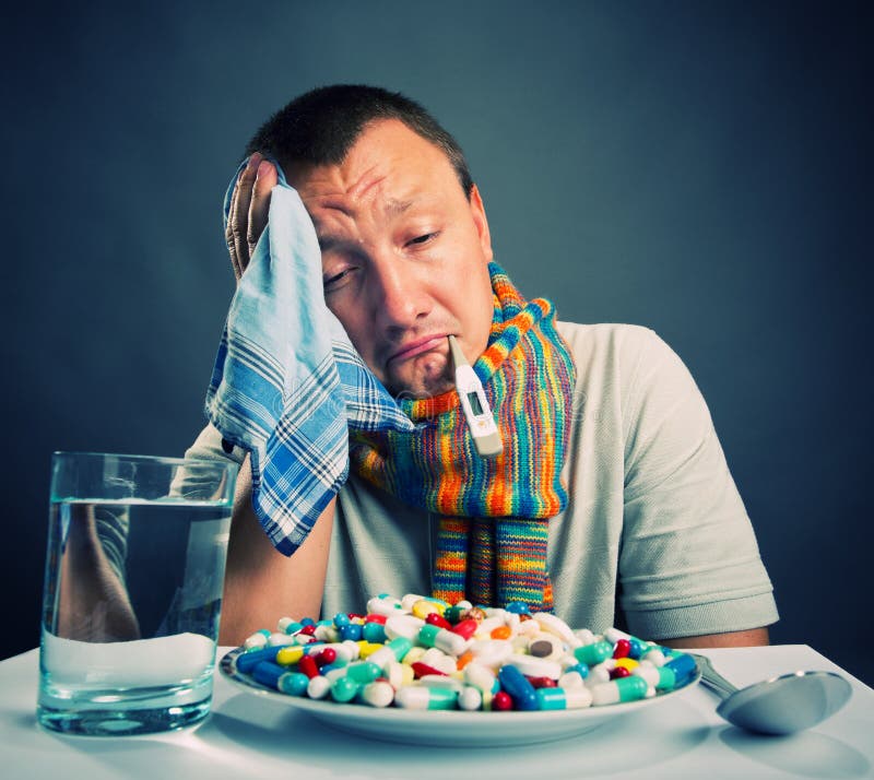 Man eating pills stock photo. Image of ideas, herbal - 26560096