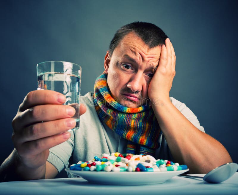 Man eating pills stock photo. Image of ideas, herbal - 26560096