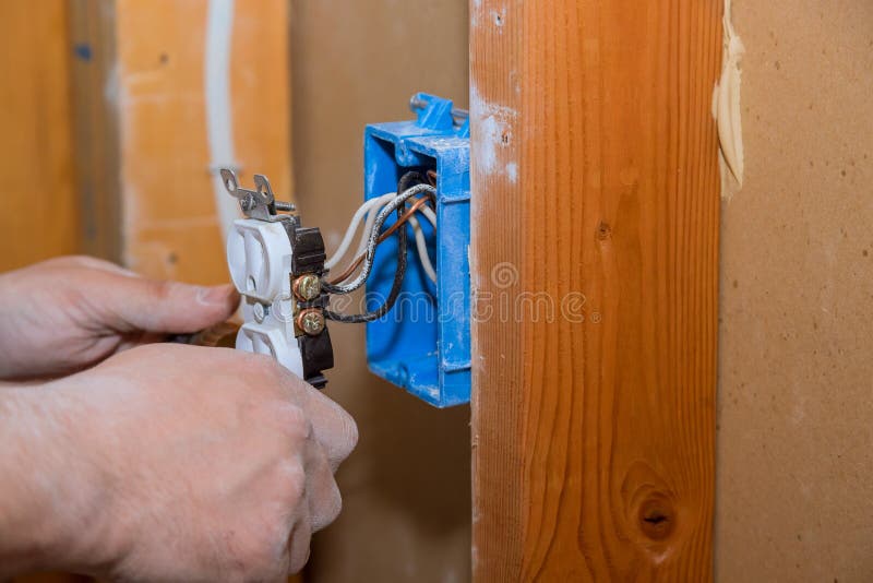 Preparing To Remove an Electrical Outlet of the Screws for Electrical ...