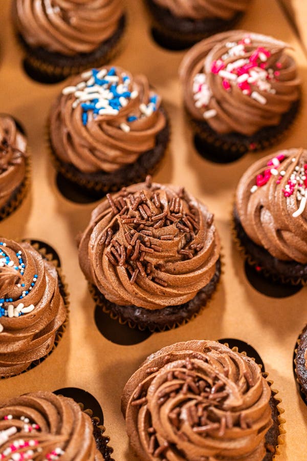 Baking Chocolate Cupcakes with Decadent Chocolate Frosting Stock Photo ...