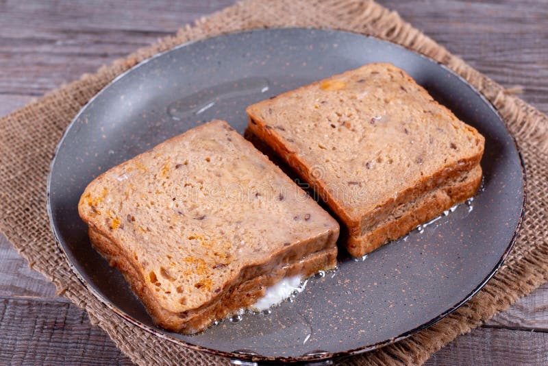 Preparing Toast with Cheese Stock Photo - Image of bran, restaurant ...