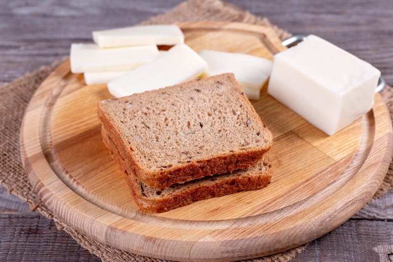 Preparing Toast with Cheese Stock Photo - Image of breast, orange ...