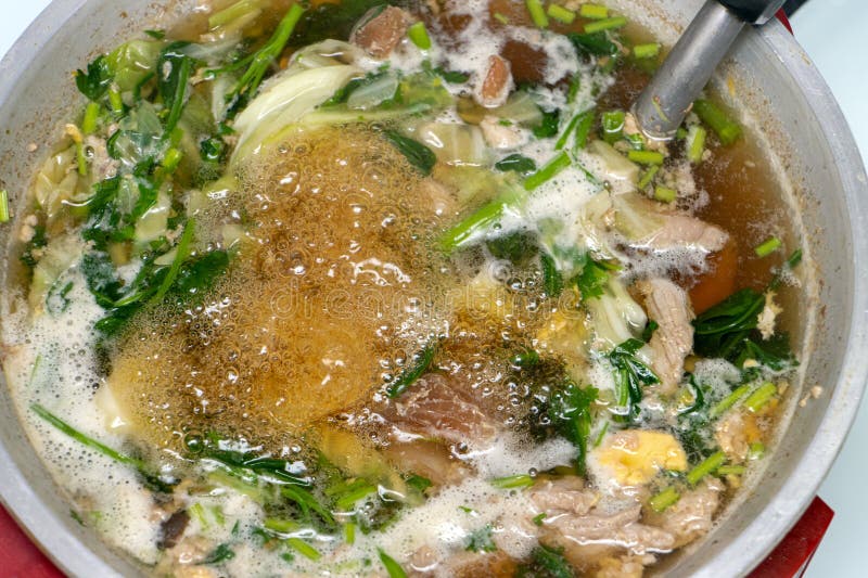 Preparing Traditional Suki Soup by Cooking in a Pot Stock Image - Image ...