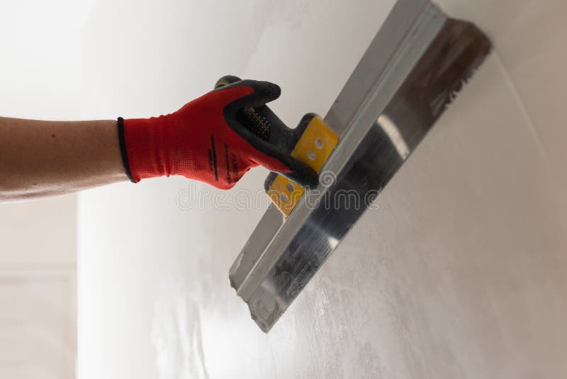 Leveling the Walls with White Putty Stock Image - Image of handyman ...