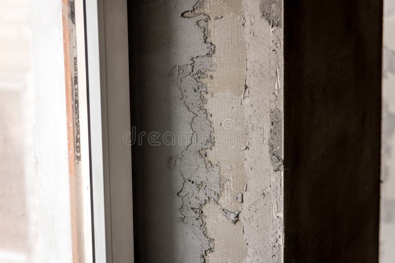 Repair in the Slopes of the Window. the Process of Applying a Layer of ...