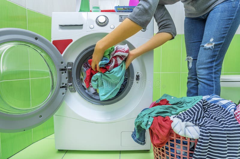 Preparing the wash cycle. stock photo. Image of care - 89376128
