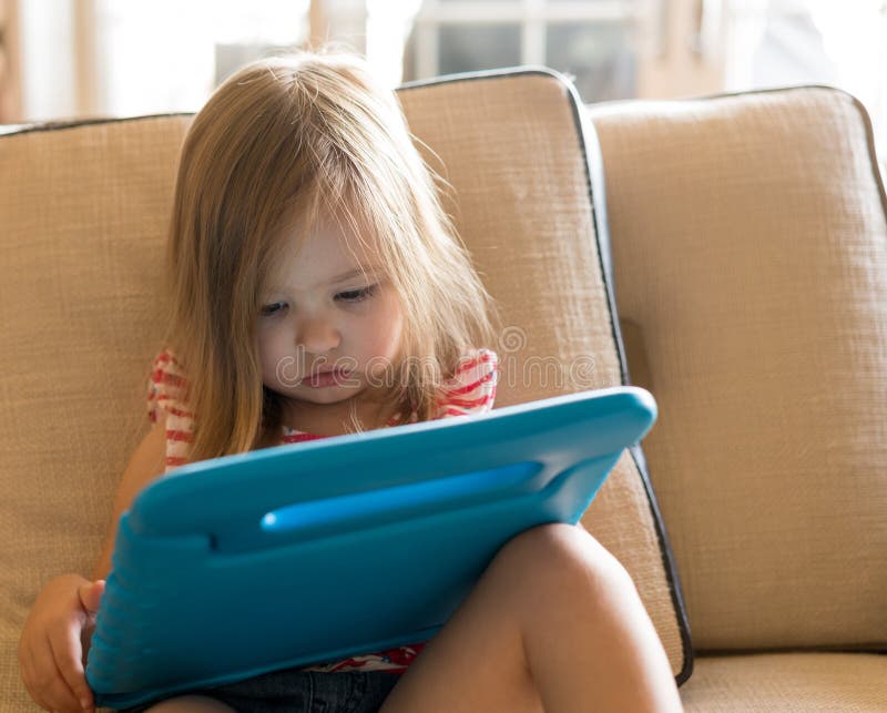Preschool Girl Using a Tablet Computer at Home Stock Image - Image of ...