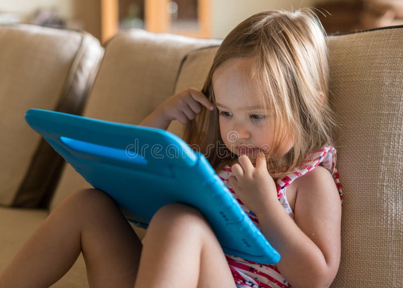 Preschool Girl Using a Tablet Computer at Home Stock Image - Image of ...