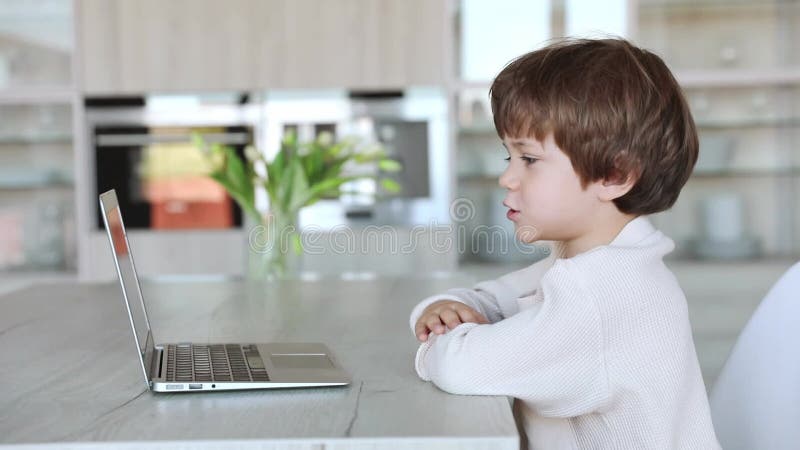 A Preschool Kid Uses Tablet Pc Stock Footage - Video of homeschool ...