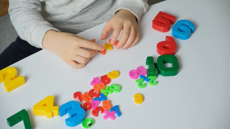 Preschool or Primary School Child Putting Together Math Examples from ...