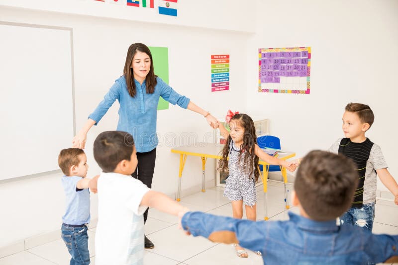 Teacher and Students Making a Circle Stock Photo - Image of people ...