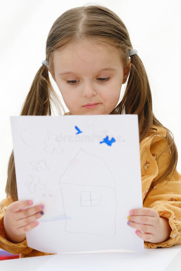 A Preschooler Girl is Looking at a Drawing she Has Drawn. Stock Image ...