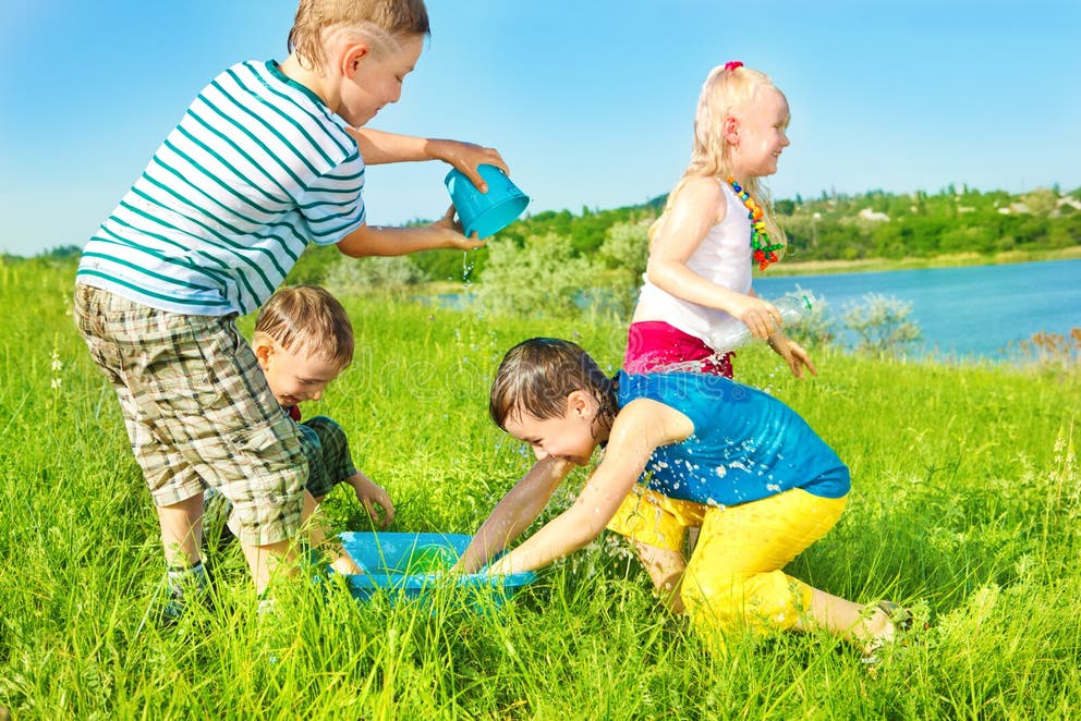 Preschoolers Spreading Water Stock Photo - Image of enjoying, excited ...