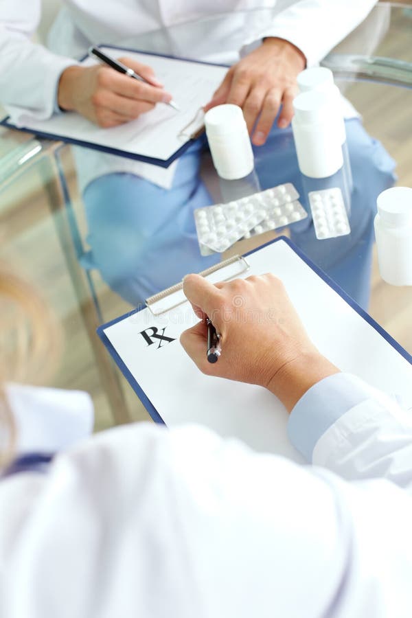 Prescribing tablets stock photo. Image of busy, adult - 29515184