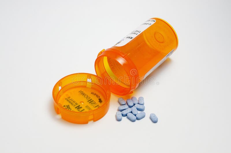 Prescription Bottle and Blue Pills Stock Photo - Image of orange ...