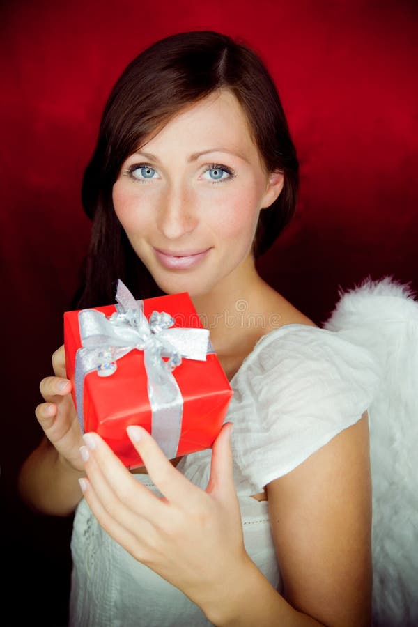 Present angel stock photo. Image of excitement, december - 16524540