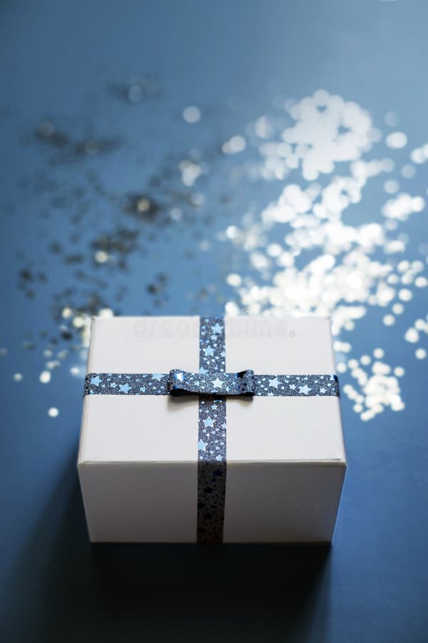Present on Blue Trendy Background with Confetti. Stock Image - Image of ...