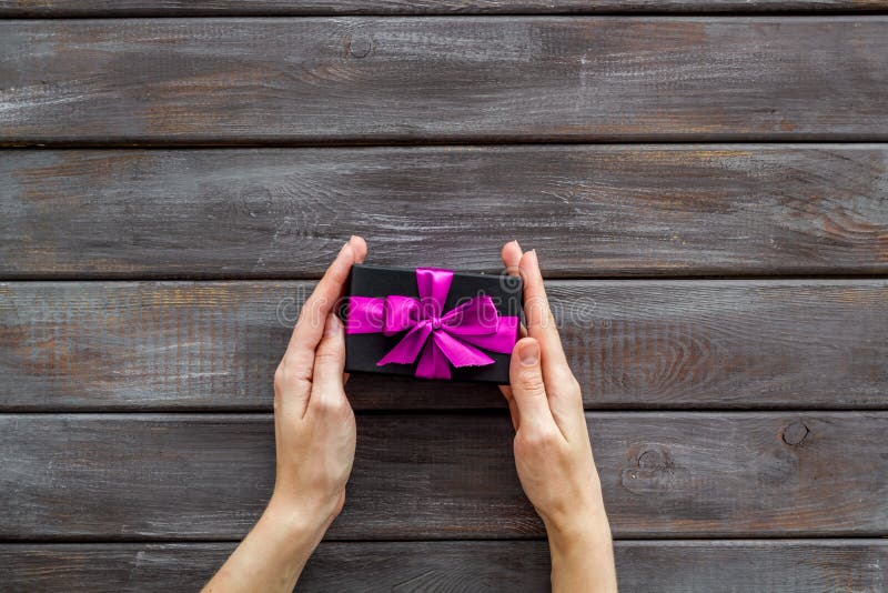 Present in Box with Hands on Wooden Background Top View Mock-up Stock ...