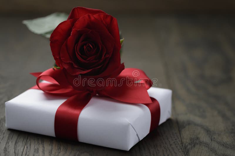 Present Box with Rose Flower Stock Photo - Image of expanded, leaf ...