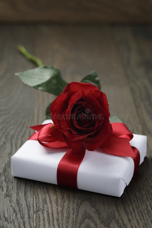 Present Box with Rose Flower Stock Photo - Image of package, covered ...