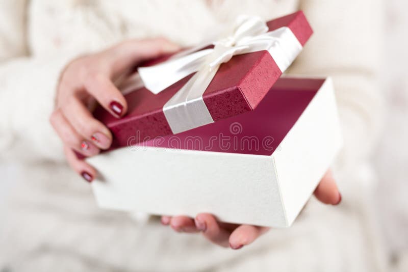 Present Box in Woman`s Hands Stock Photo - Image of white, event: 105802816