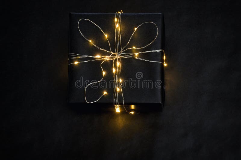 Present Box Wrapped with String Lights Stock Photo - Image of sharing ...