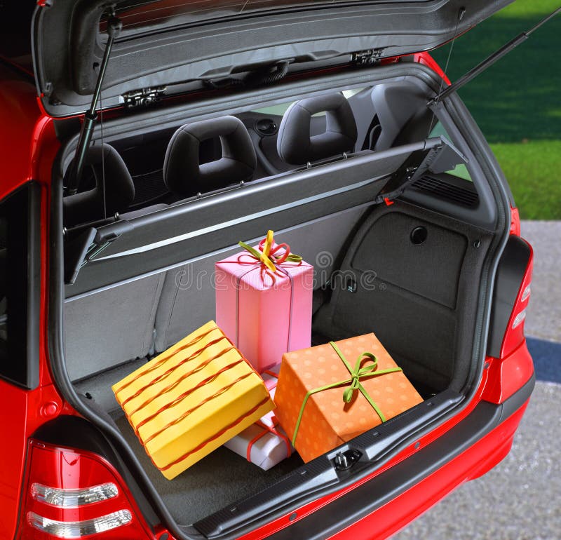 Red present in a car stock image. Image of package, amorous - 11597611
