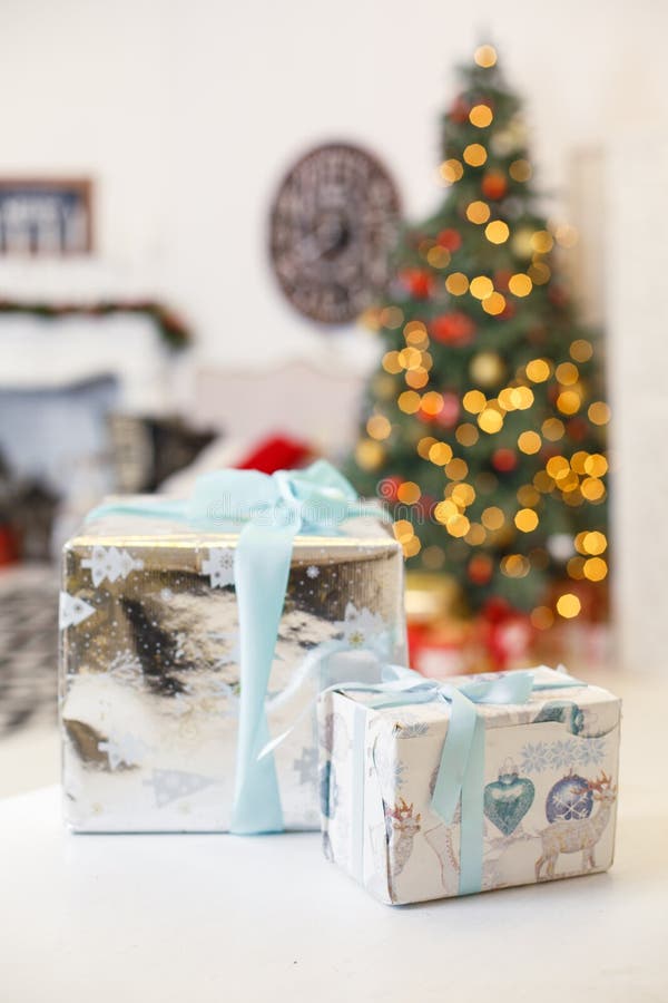 Present Boxes Under Fir-tree Stock Photo - Image of card, decorative ...