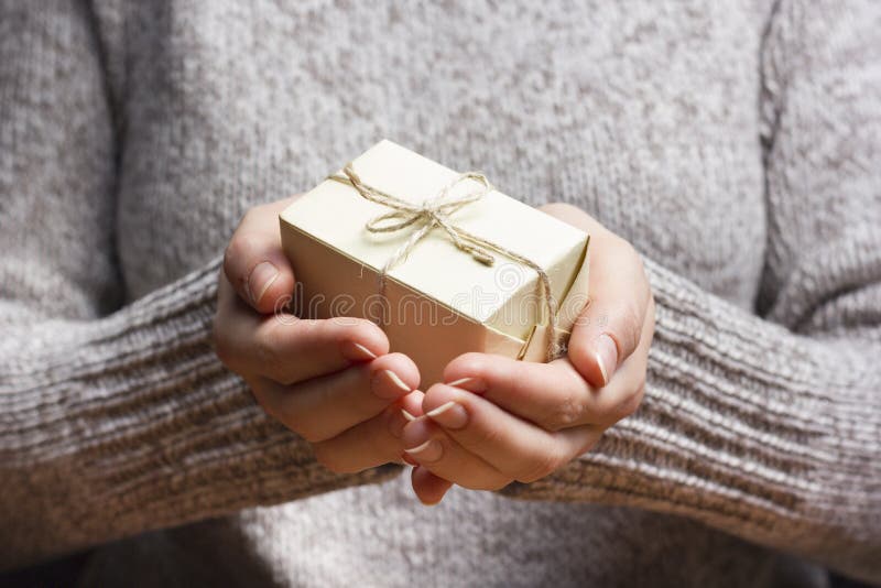 Present, Gift. Close Up of Female Hands Holding Small Gift Stock Image ...