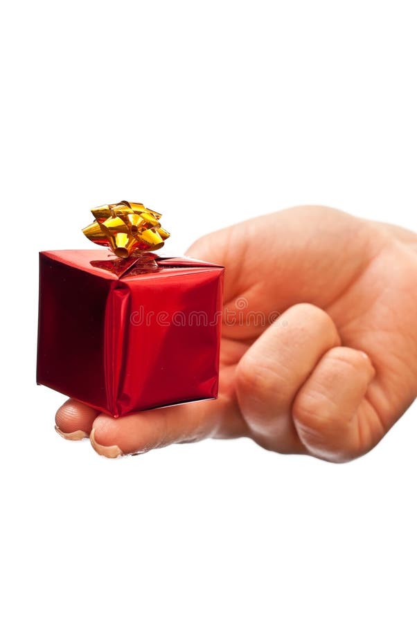 Man s hand holding a gift stock image. Image of color - 63481287