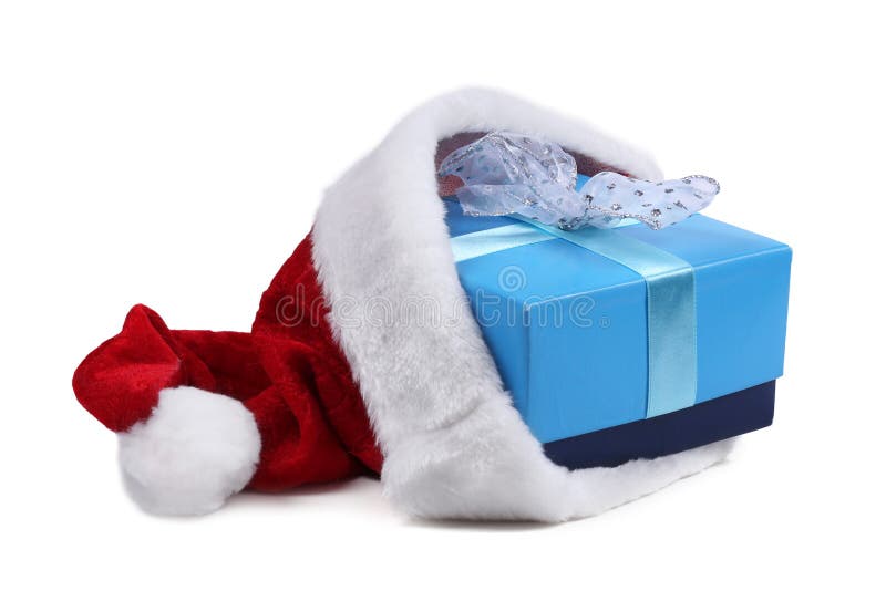 Present in Santa Claus hat stock photo. Image of festive - 1568916