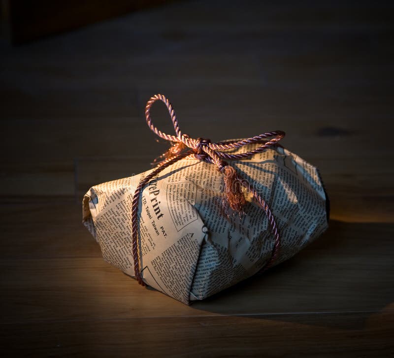 Present Wrapped in Newspaper Stock Image - Image of surface, newspaper ...