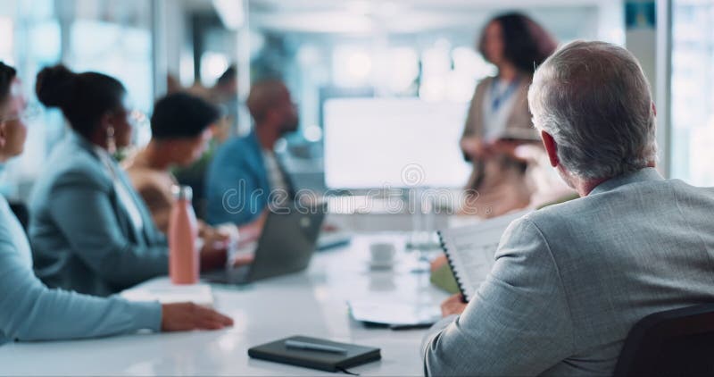 Presentation, Back of Man and People in Office for Feedback, Meeting or ...