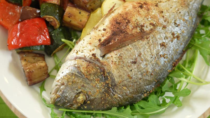 Baked Dorado Fish with Vegetable Salsa and Grilled Vegetables Stock ...