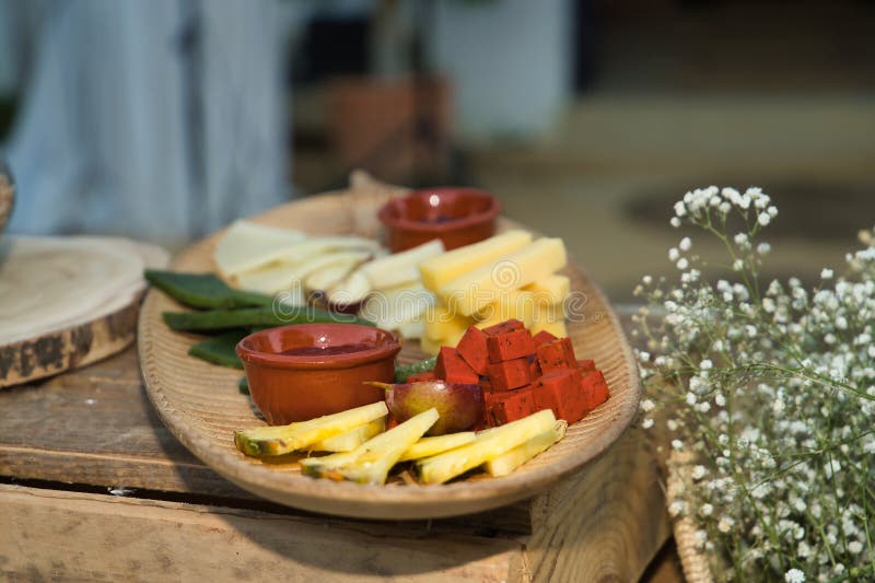 Presentation of Different Varieties of Cheeses Accompanied with ...