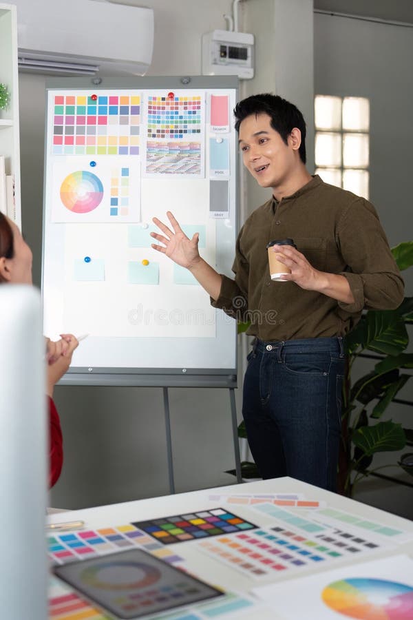 Presentation and Feedback in Design. a Designer Presenting Ideas with a ...