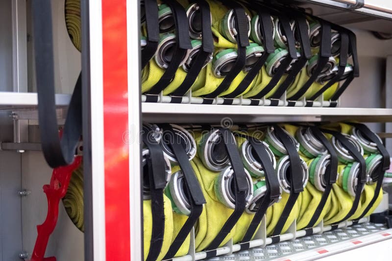 Presentation of Fire Fighting Equipment and Tools. Yellow Fire Hoses ...