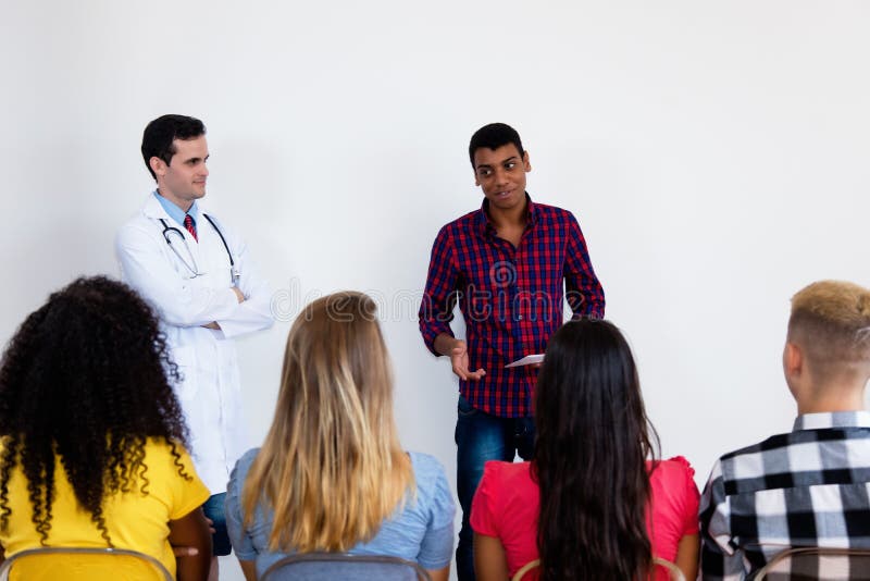 Presentation of Medical Student with Doctor Stock Image - Image of ...