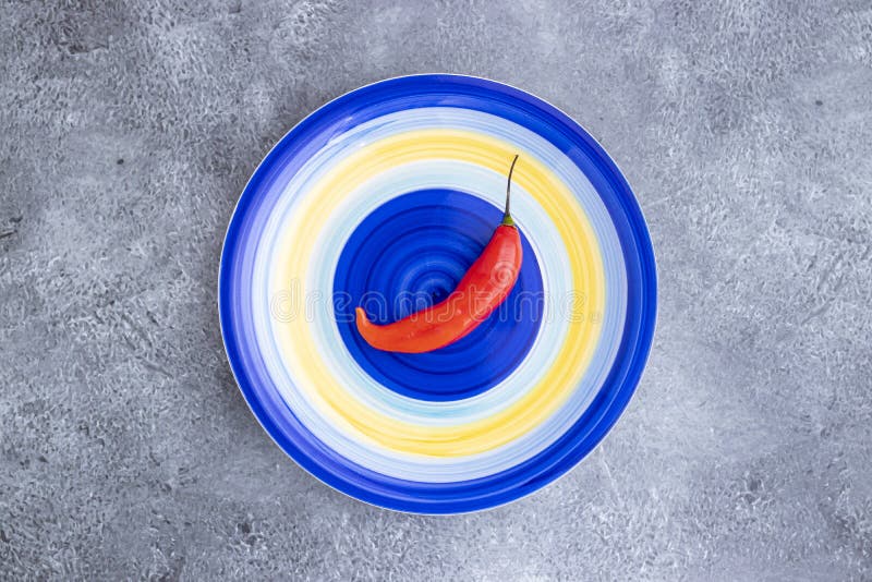 Presentation of the Peruvian Red Hot Chili in a Colored Plate Stock ...