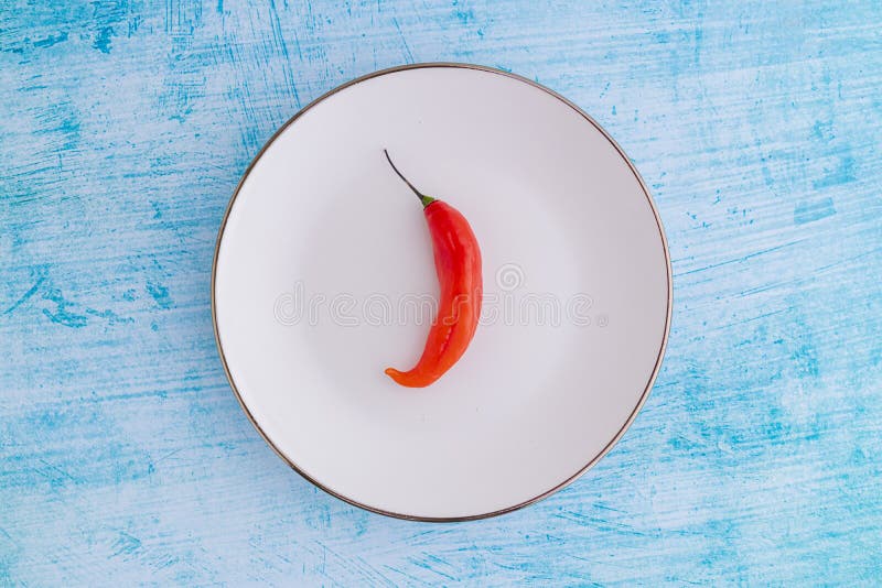 Presentation of the Peruvian Red Hot Chili in a Colored Plate Stock ...