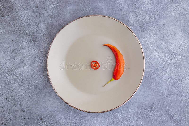 Presentation of the Peruvian Red Hot Chili in a Colored Plate Stock ...
