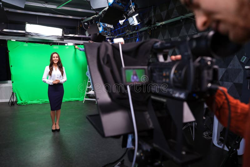 Presenter and Video Camera Operator Working. News Broadcasting Stock ...
