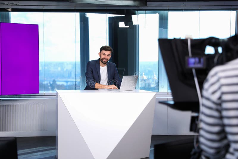 Presenter and Video Camera Operator Working. News Broadcasting Stock ...